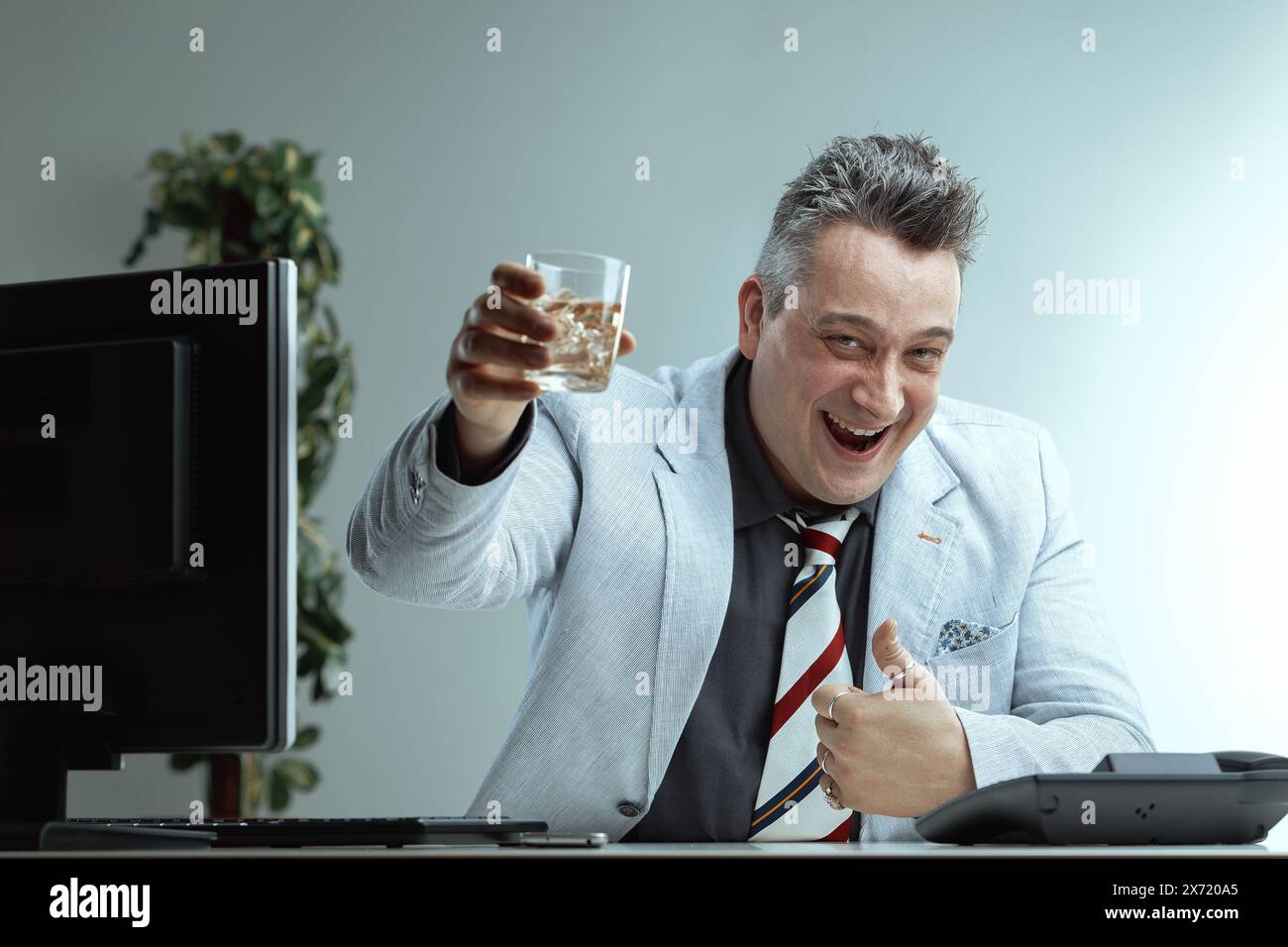 Seated man in formal attire hi-res stock photography and images - Alamy