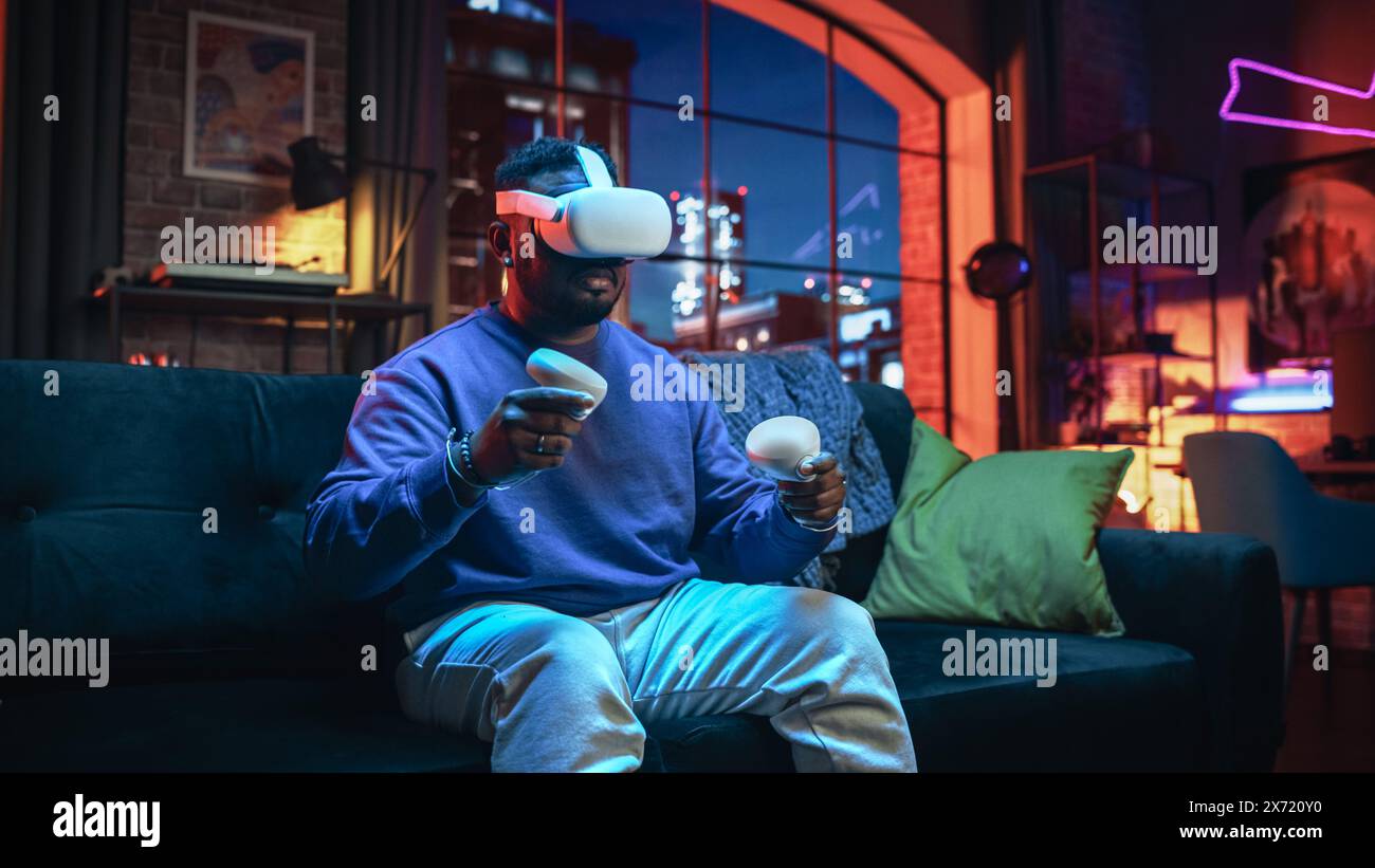 Gamer playing vr action game hi-res stock photography and images - Alamy