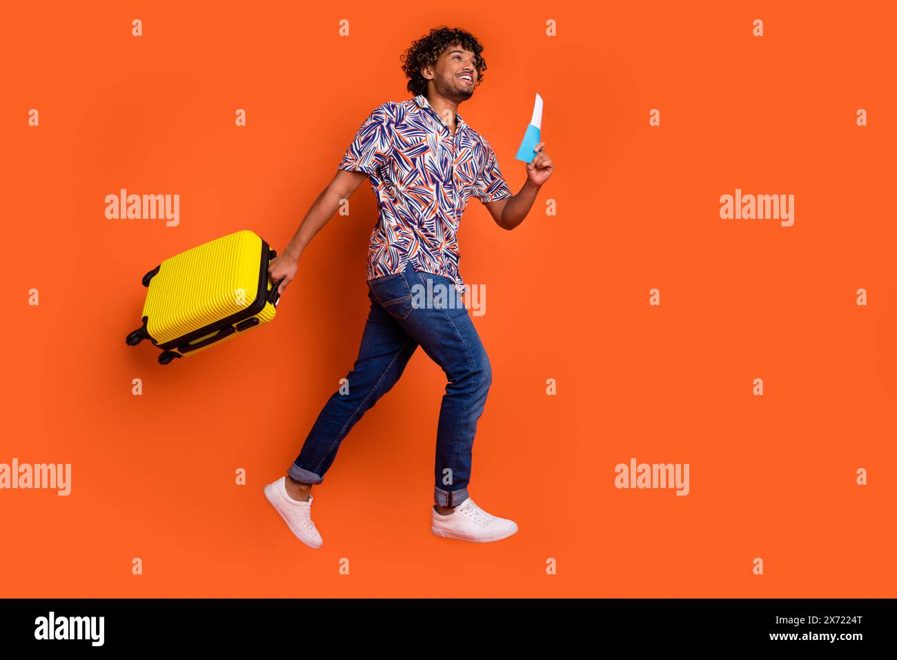Full body photo of attractive young man running hold baggage tickets ...