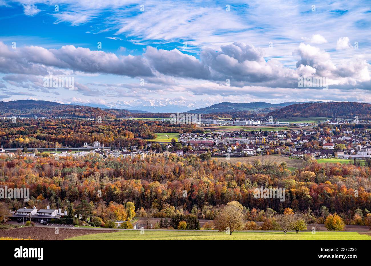 Autumn view over the Swiss landscape from a viewpoint. Several cities ...
