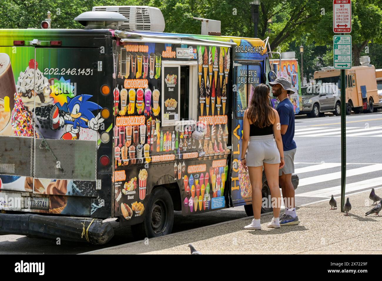 Washington DC, USA - 3 May 2024: People choosing ice cream flavours ...