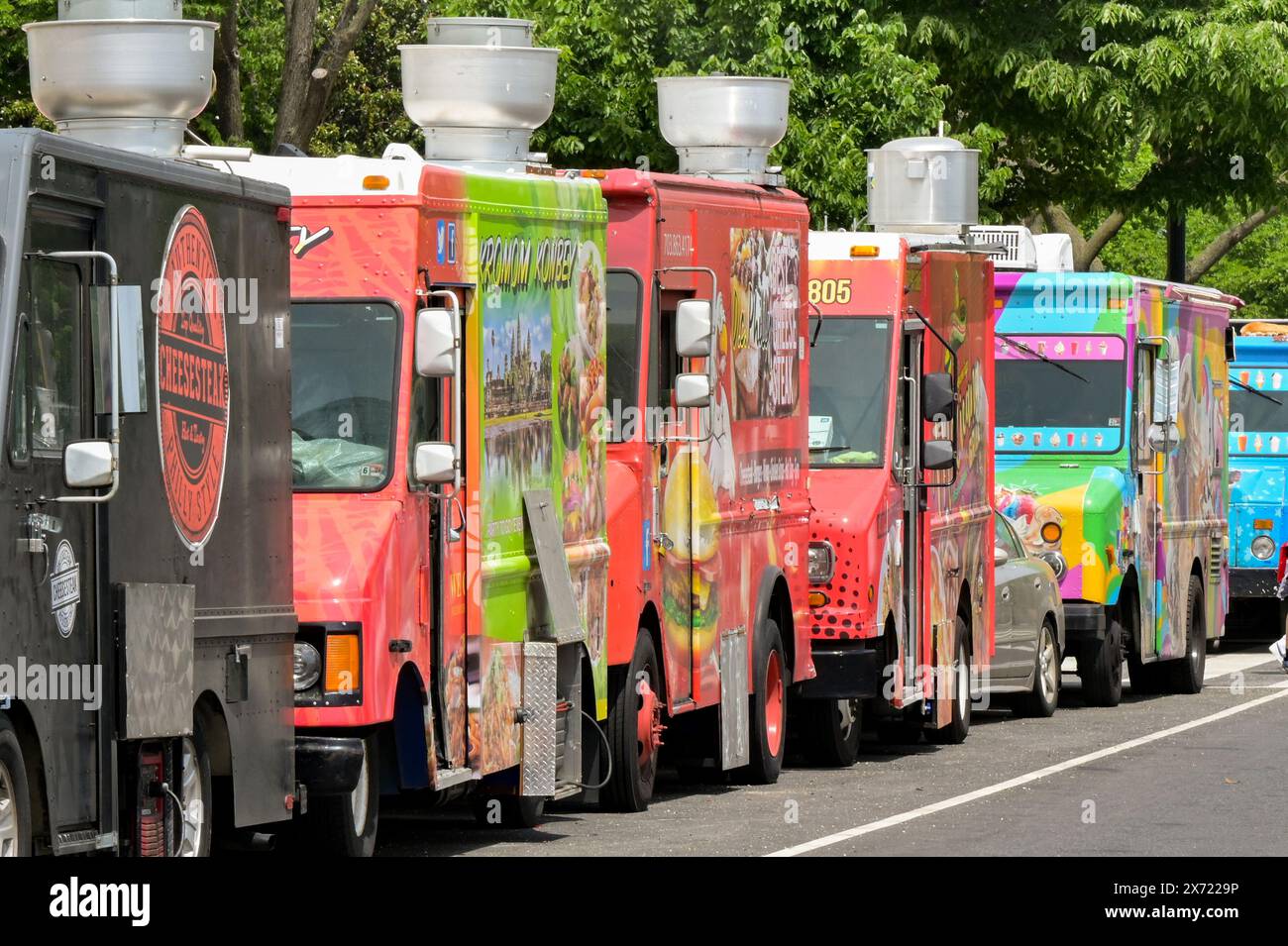 Washington DC, USA - 3 May 2024: Row of fast food and ice cream trucks ...