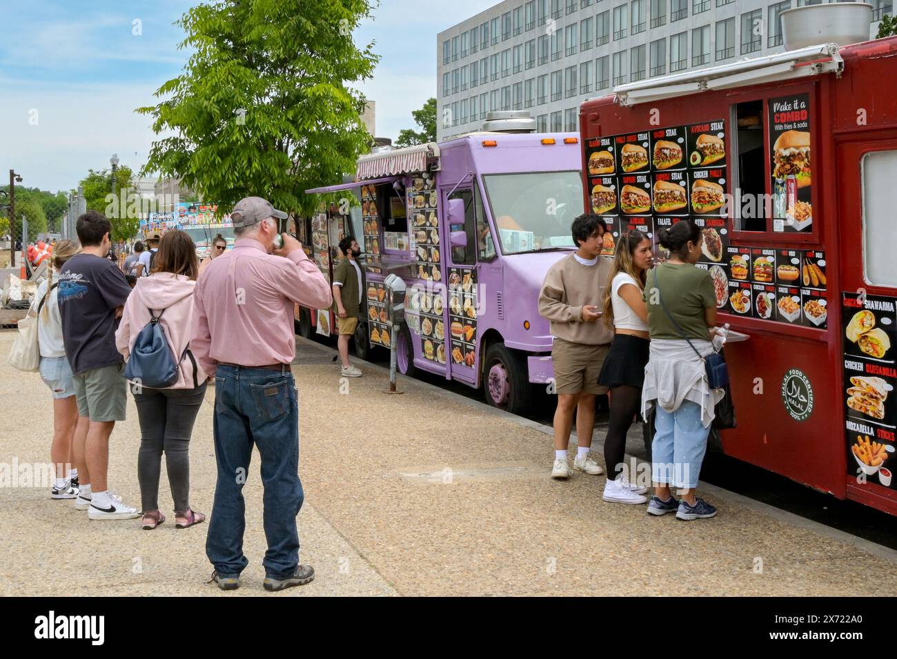 Washington DC, USA - 3 May 2024: People buying fast food from a mobile ...
