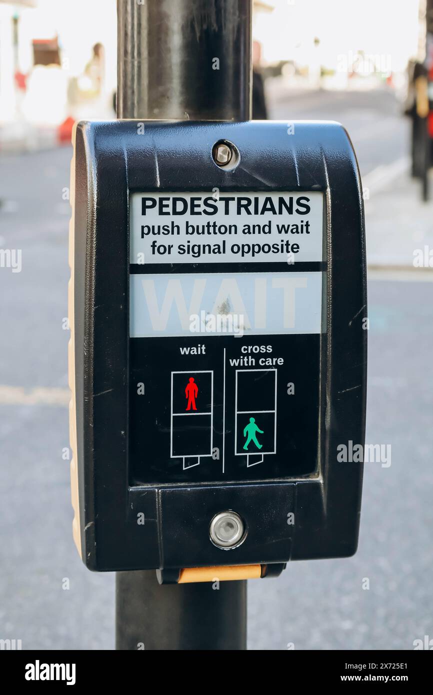 Pedestrian Crossing button in London City Centre Stock Photo - Alamy