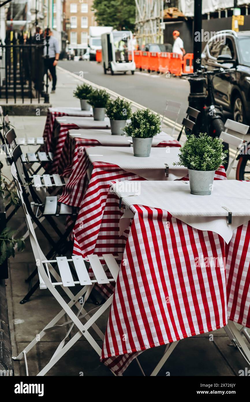 Tables on a terrace in a restaurant in Soho in London Stock Photo - Alamy