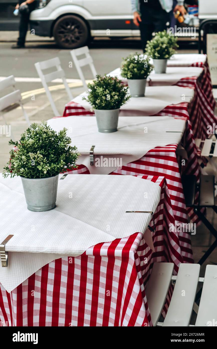 Tables on a terrace in a restaurant in Soho in London Stock Photo - Alamy