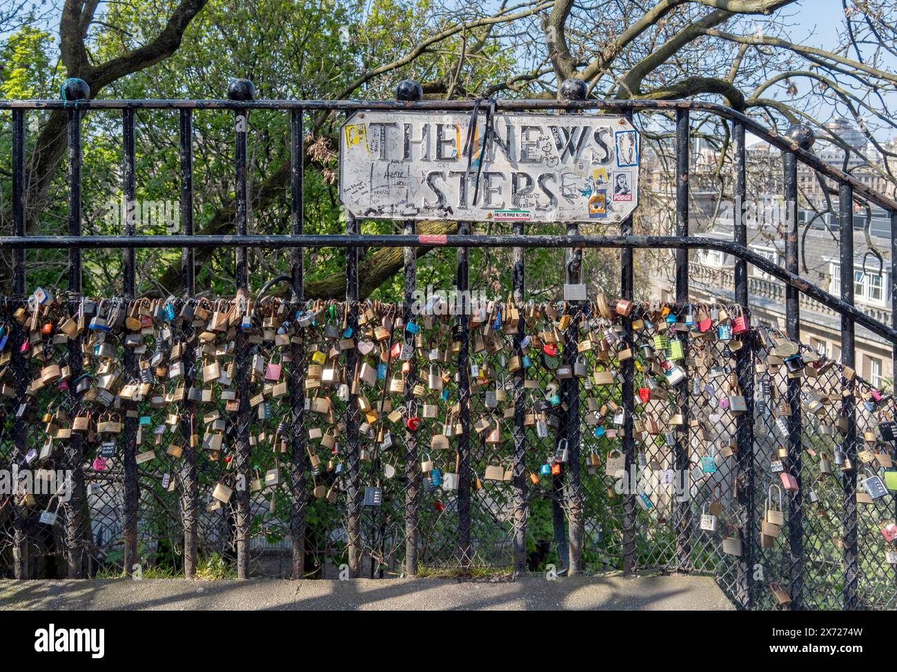 Love Locks attached to a fence on The News Steps, Edinburgh, Scotland ...