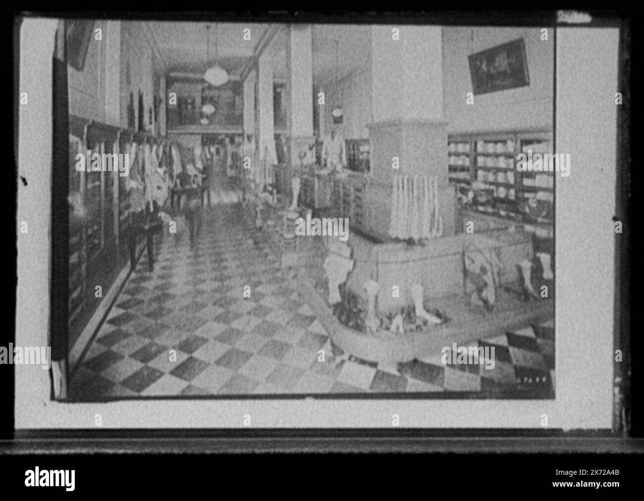 Men's clothing store, interior, Title devised by cataloger., "67688" on ...