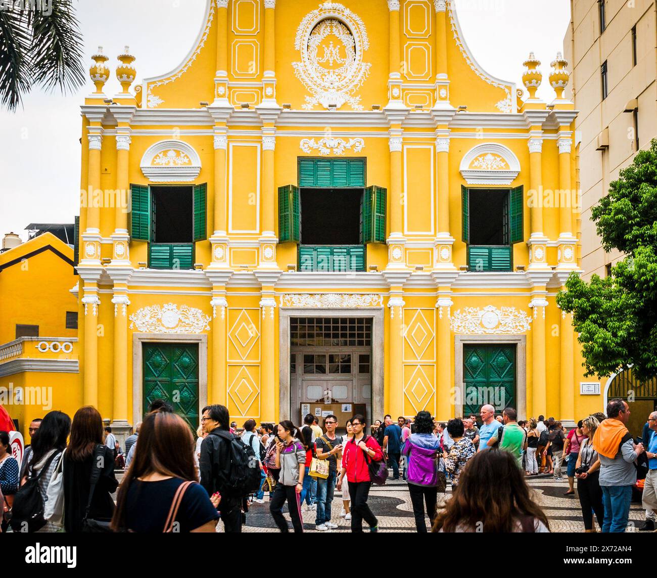 the exterior of St Dominic's Church in Macau with tourists in front Stock Photo - Alamy
