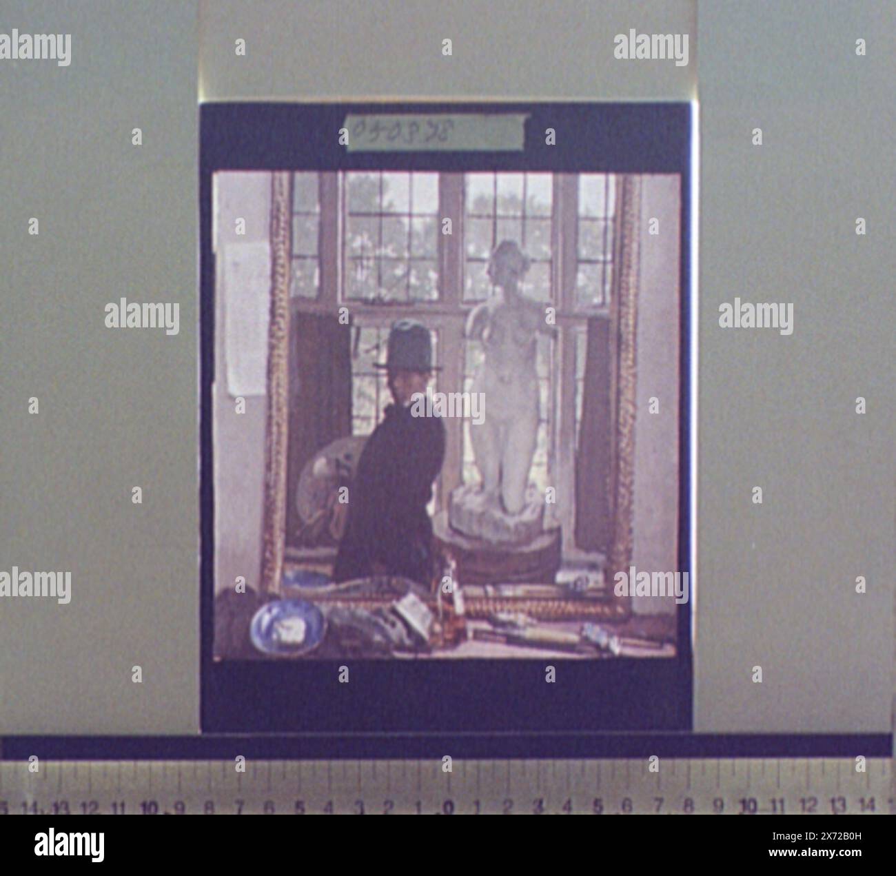 Artist with sculpture reflected in mirror, Title devised by cataloger ...