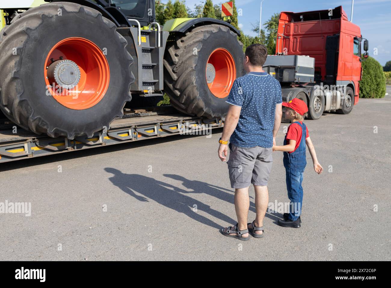 Small man big car hi-res stock photography and images - Alamy