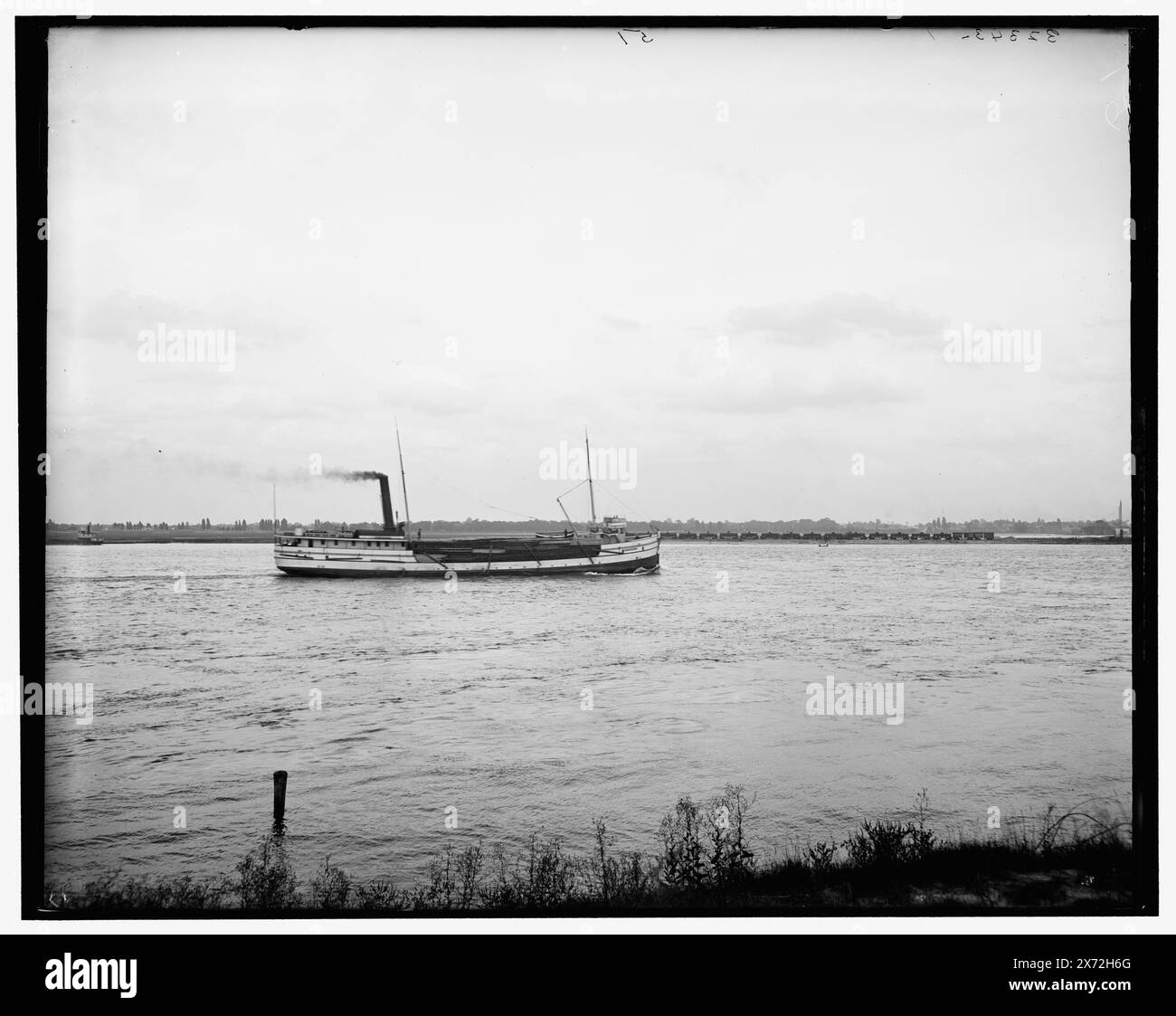Cargo ships on river Cut Out Stock Images & Pictures - Alamy