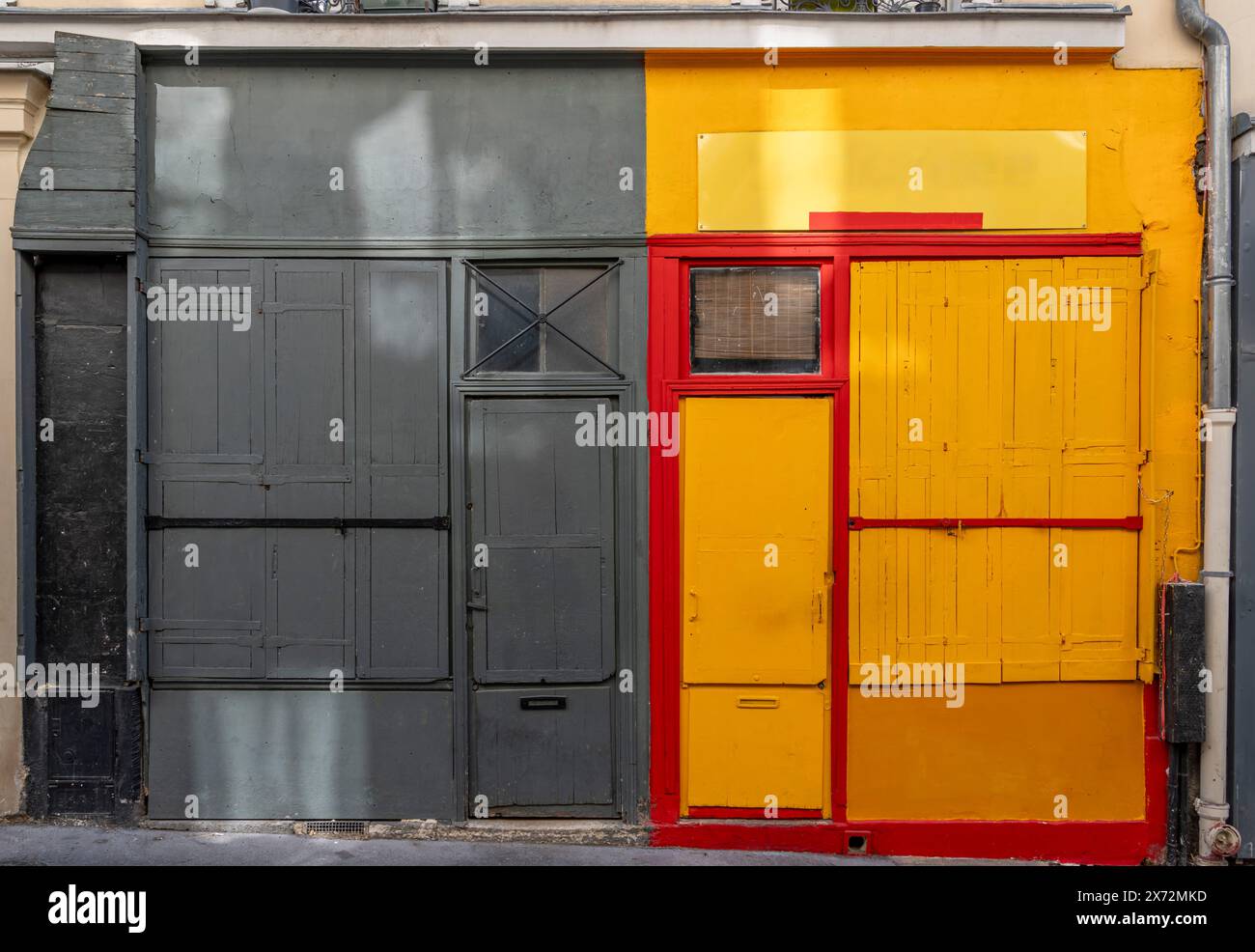 Paris, France - 05 11 2024: View of typical gray, yellow and red ...