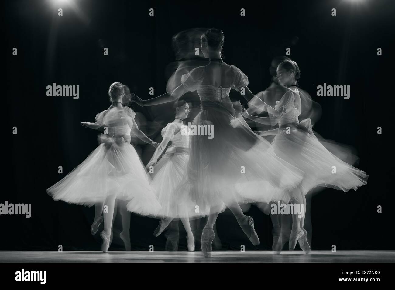 Graceful movements of four young dancers captured in ghostly blur ...
