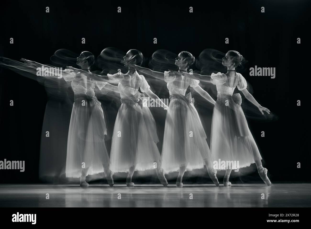 Black and white. Photo of artistic ballet dancers in mid-movement ...