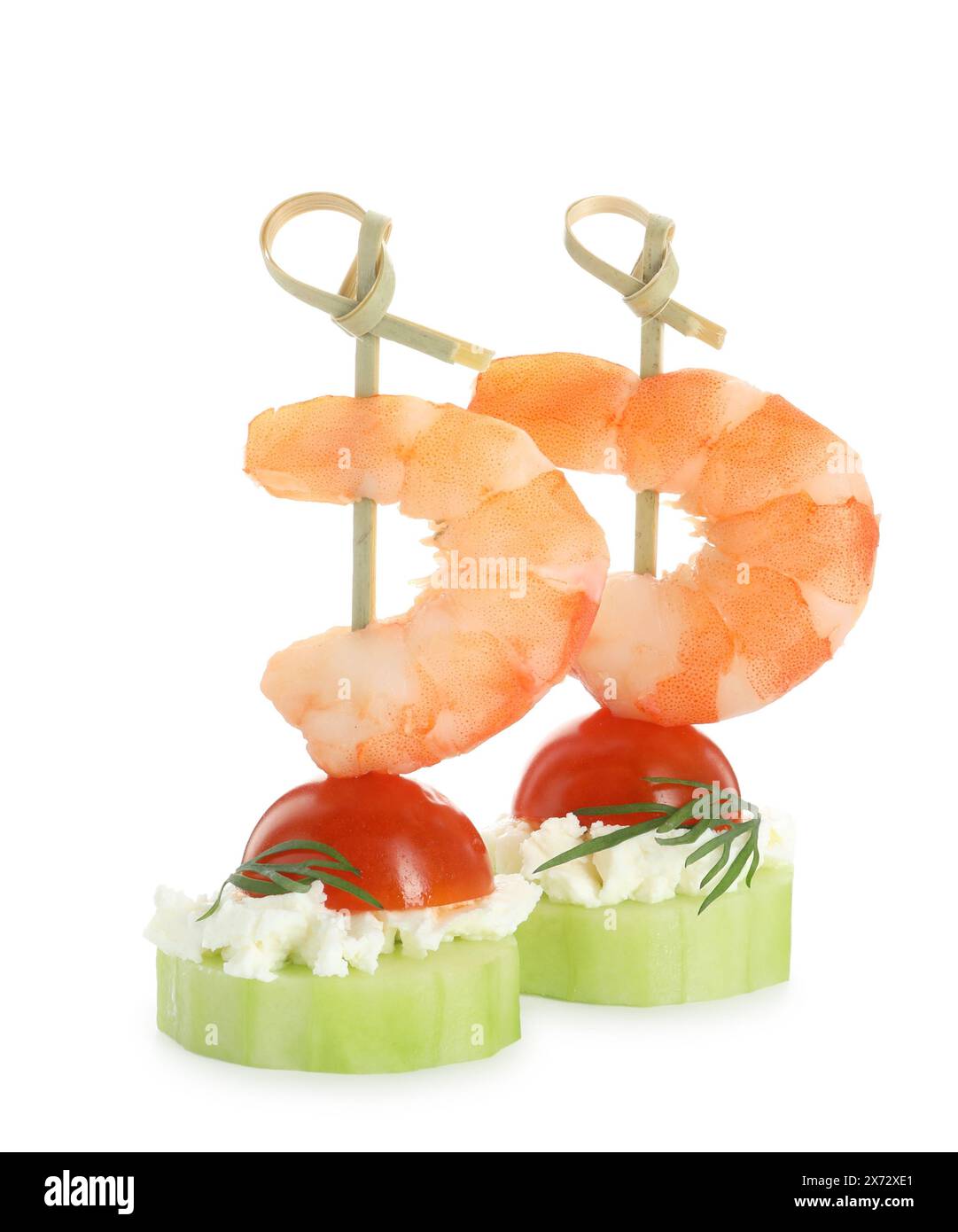 Tasty canapes with shrimps, vegetables and cream cheese isolated on ...