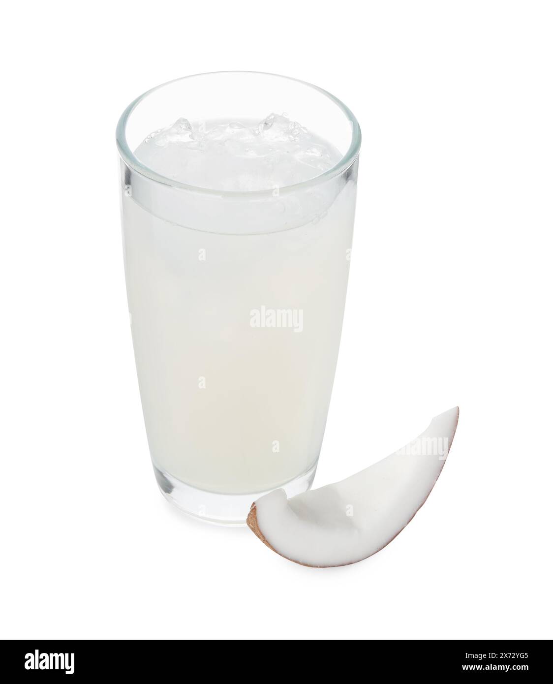 Glass of coconut water, ice cubes and nut isolated on white Stock Photo ...