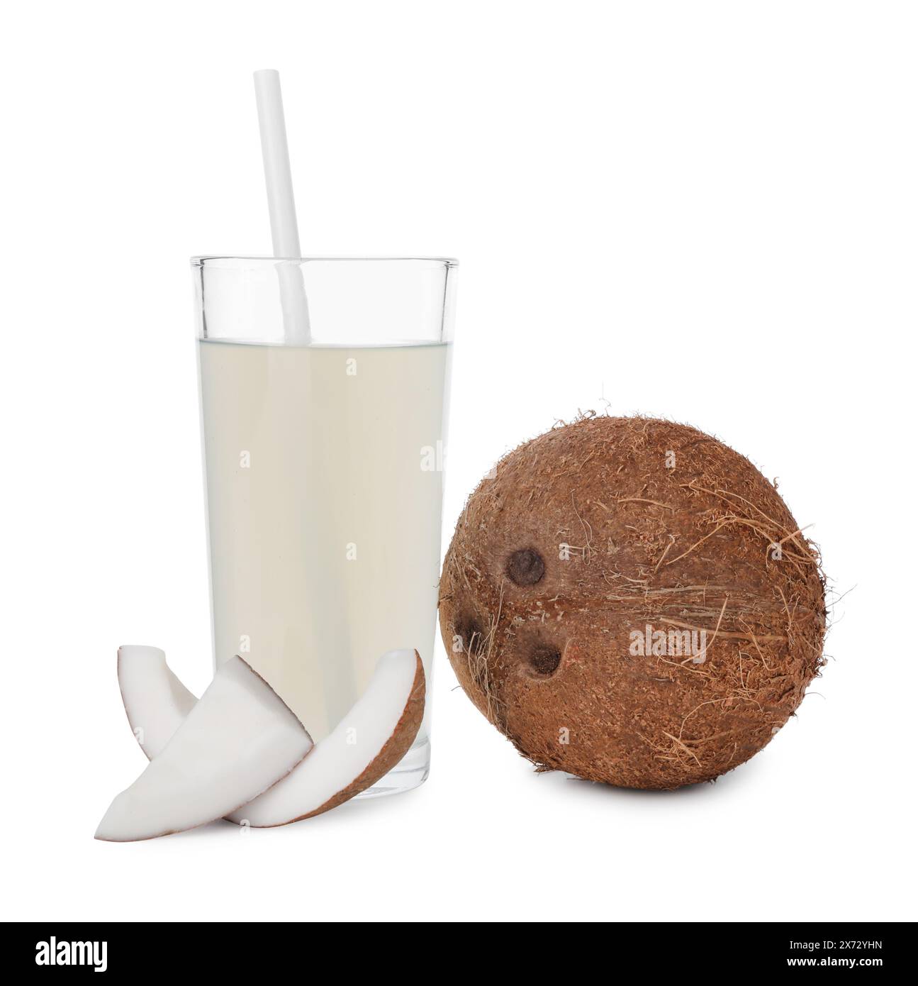 Glass of coconut water and nuts isolated on white Stock Photo - Alamy