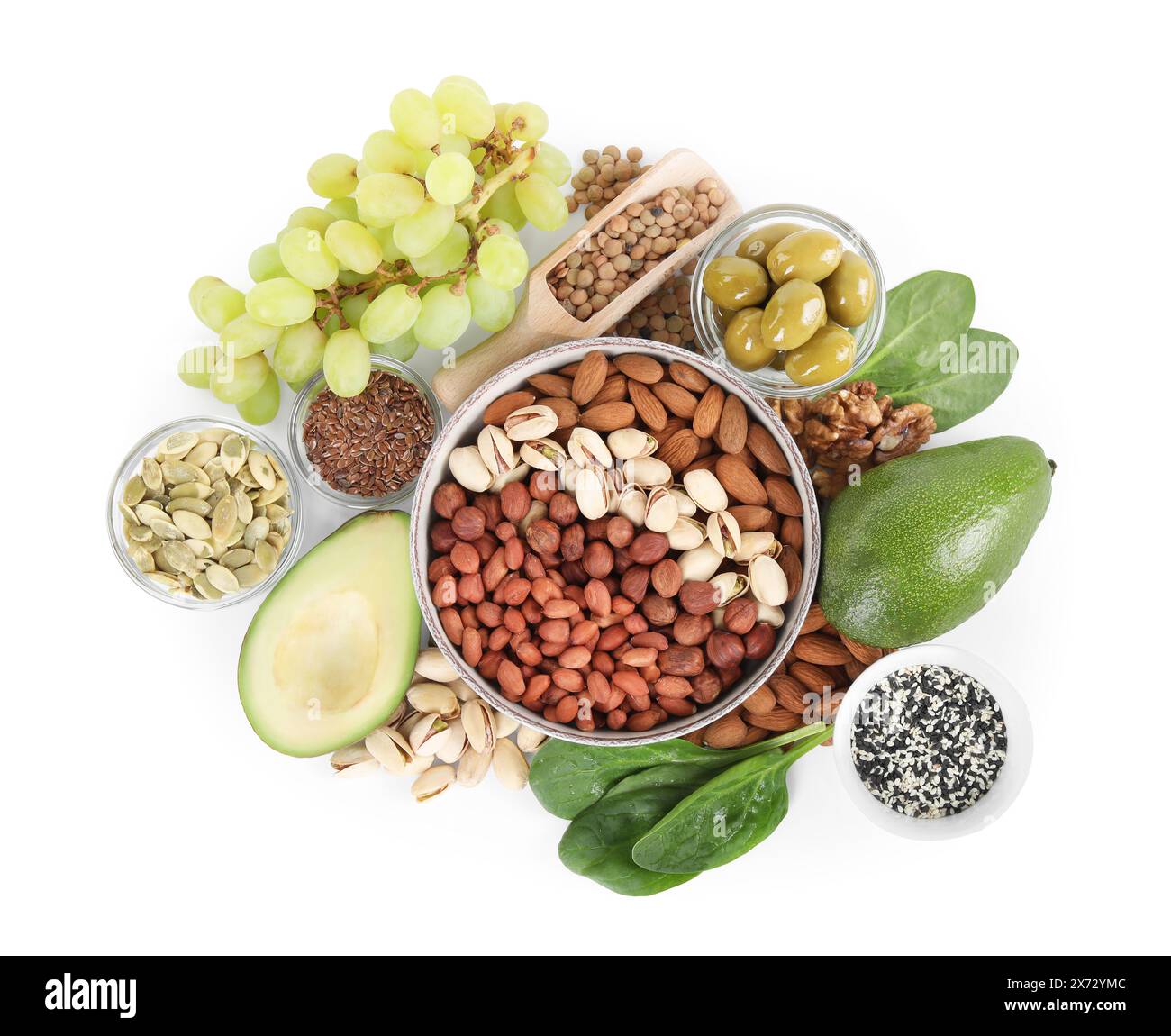 Different nuts, seeds and products high in healthy fats isolated on ...