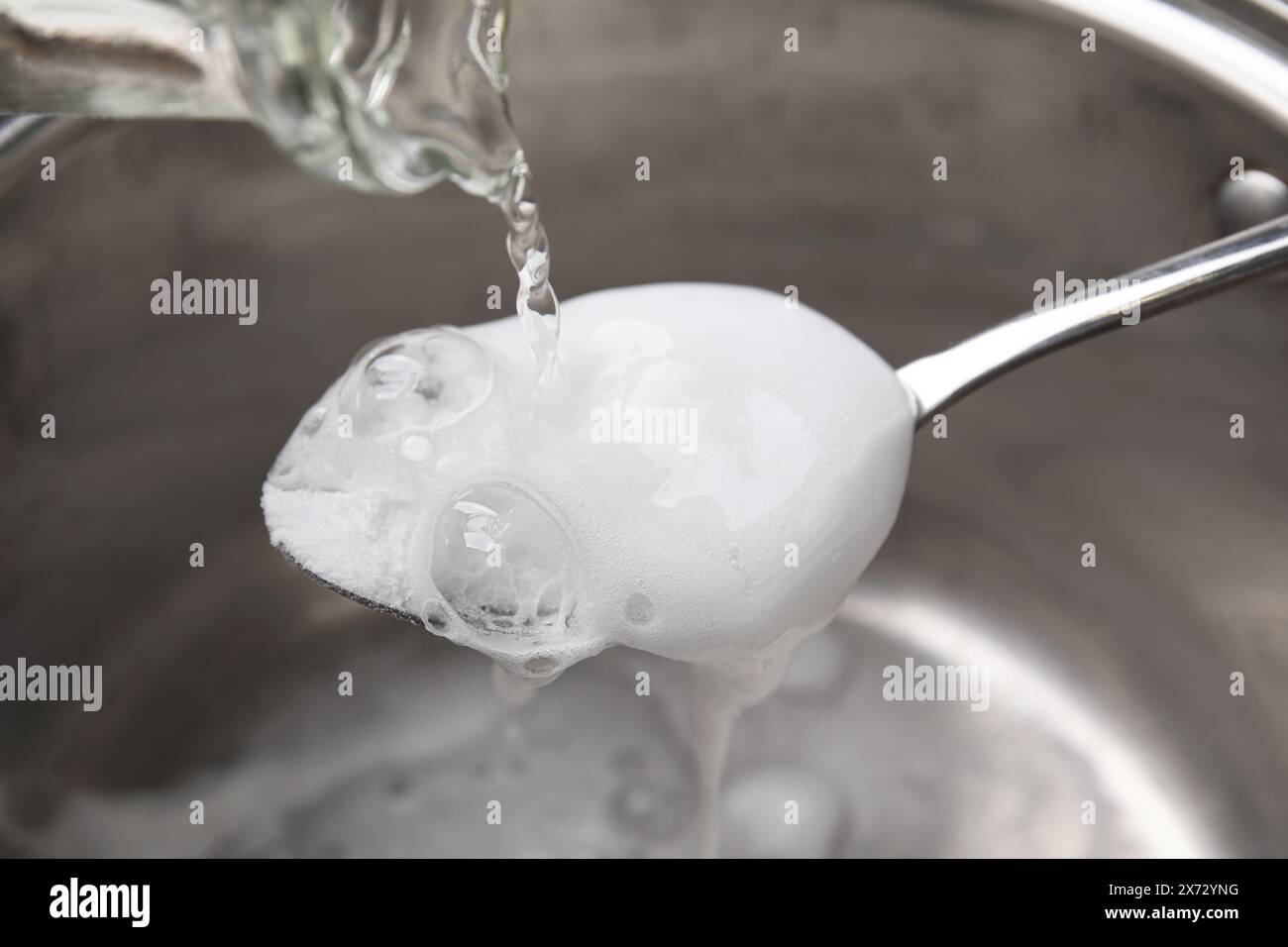 Pouring baking soda chemical reaction hi-res stock photography and ...
