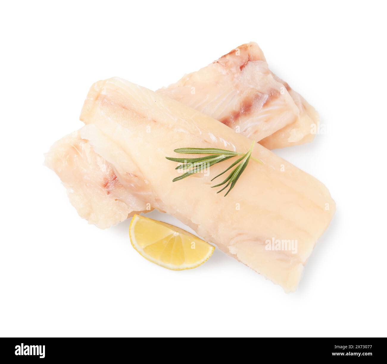 Pieces of raw cod fish, rosemary and lemon isolated on white Stock ...