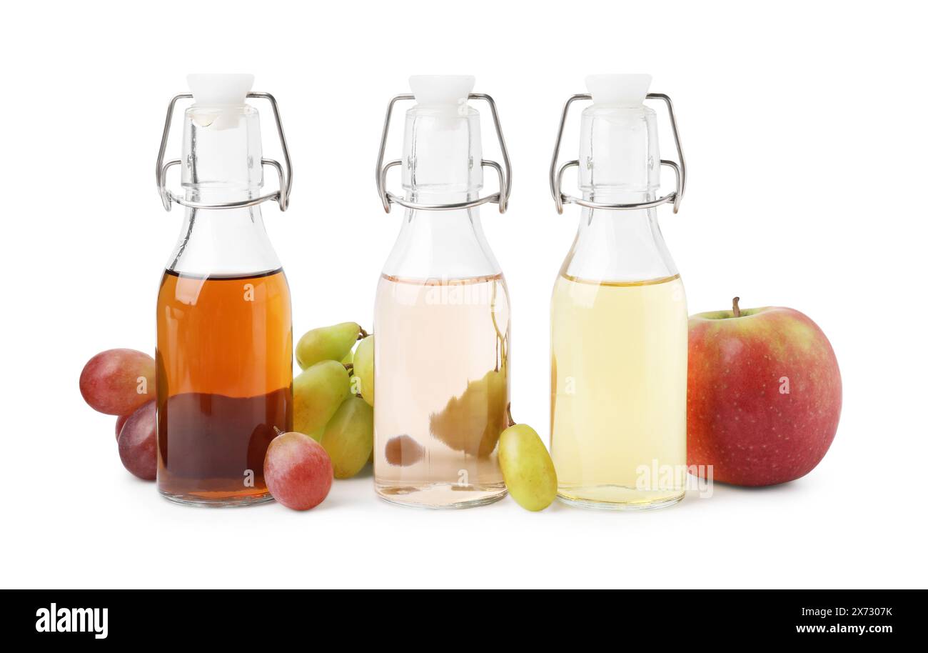 Different types of vinegar and ingredients isolated on white Stock ...