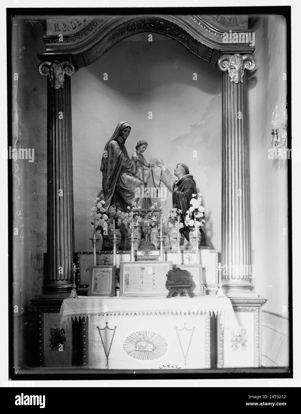 Saint with Madonna and child sculpture and altar piece, Title devised ...