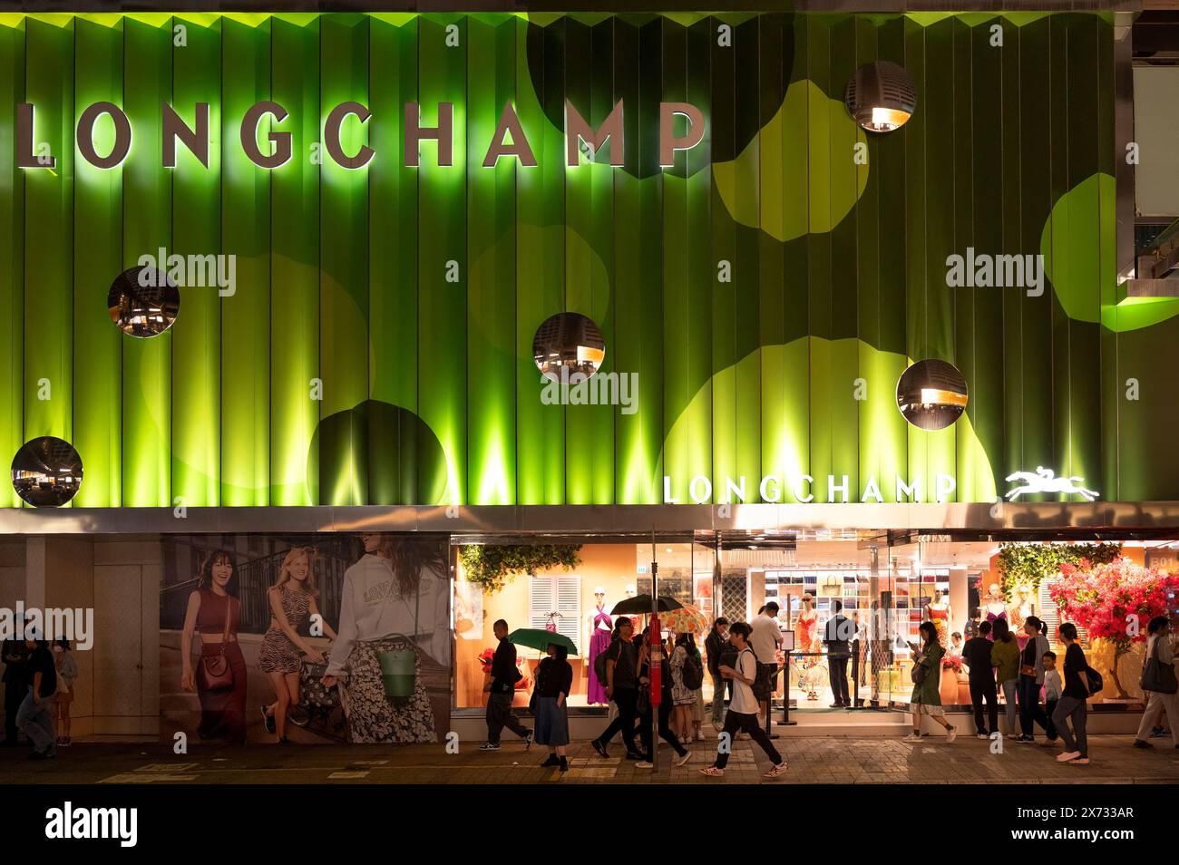 Pedestrians are seen in front of French luxury fashion brand Longchamp ...