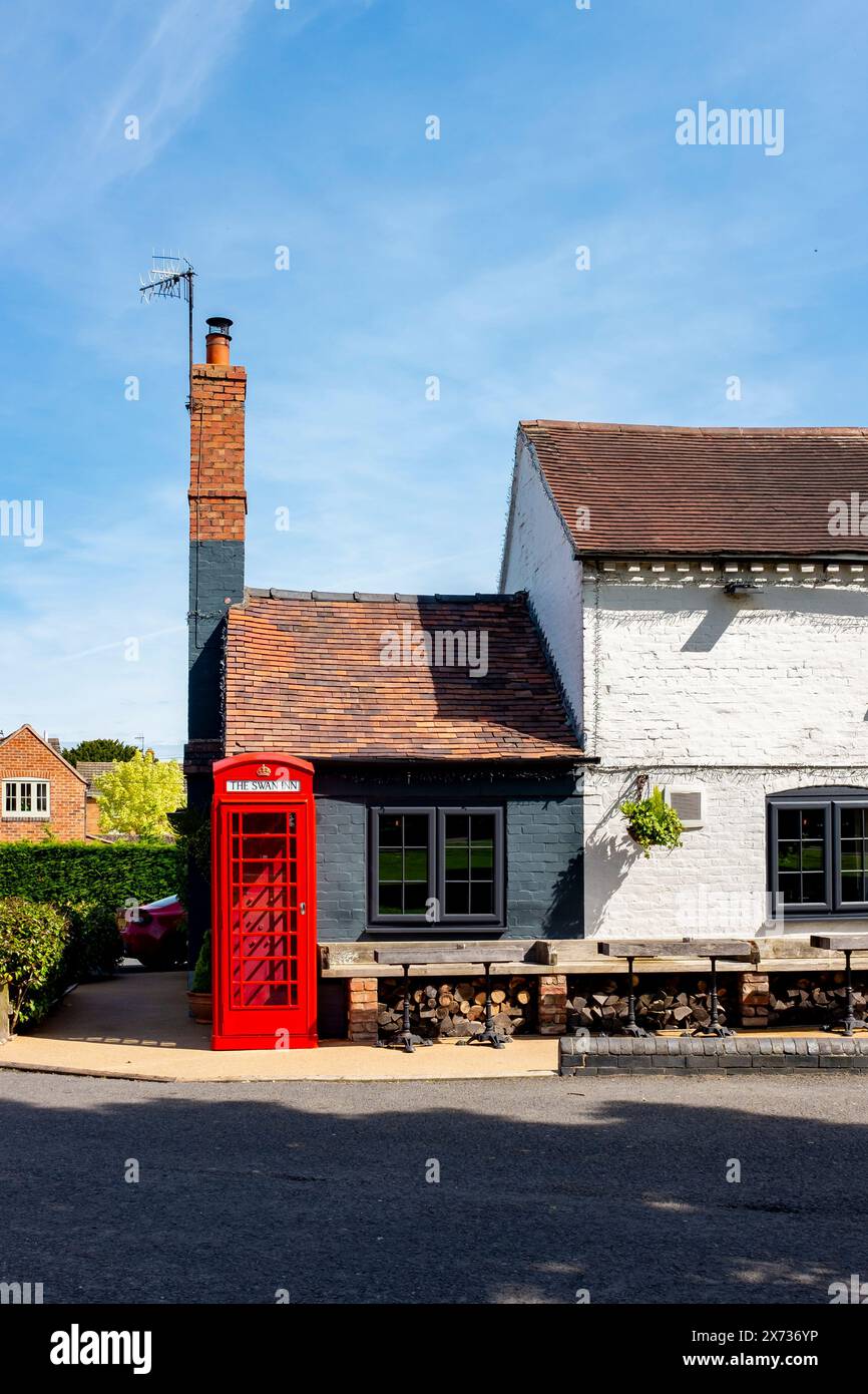 Red telephone box at The Swan Inn, Hanley Swan, Worcestershire Stock ...
