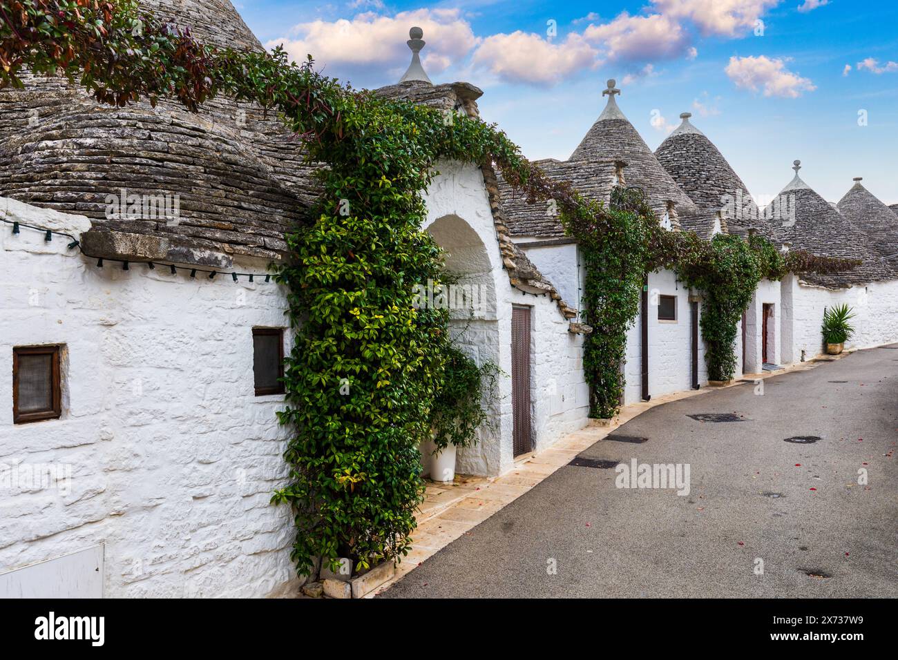 The traditional Trulli houses in Alberobello city, Apulia, Italy ...