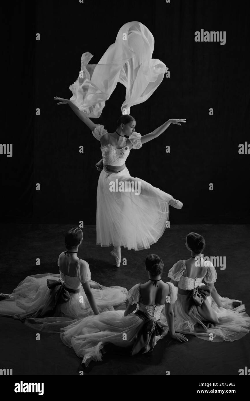 Ballerina gracefully performs wonderful dance ant flowing fabric of her ...