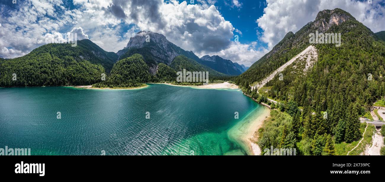 View to Julian Alps mountains above Predil lake in Italy with small ...