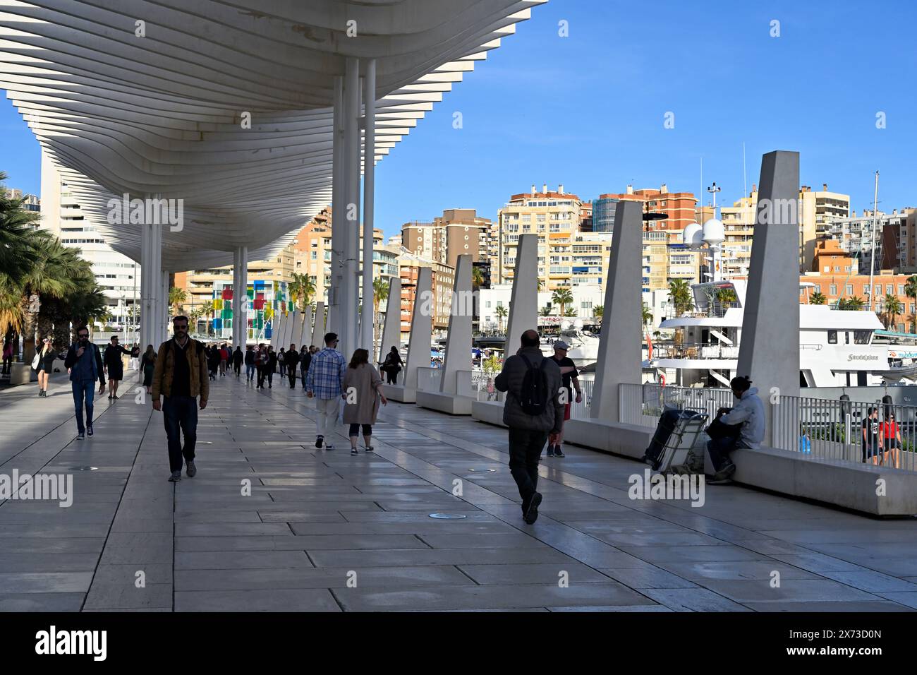 Promenade with covering to shade from sun along marina front, Malaga ...