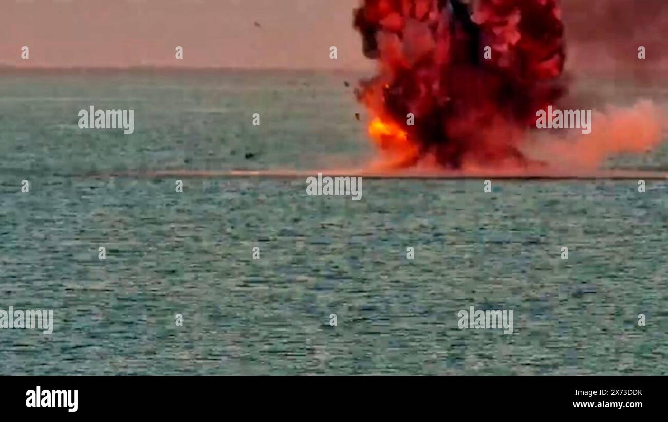This photo taken from video released by Russian Defense Ministry Press ...