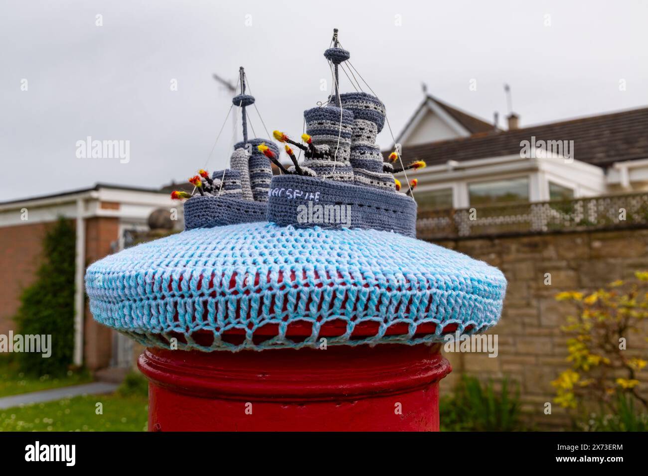 Poole, Dorset, UK. 17th May 2024. Postbox topper to commemorate 80th ...