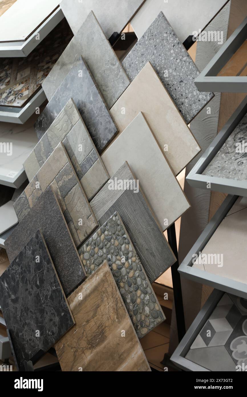Many samples of tiles on display in store Stock Photo - Alamy