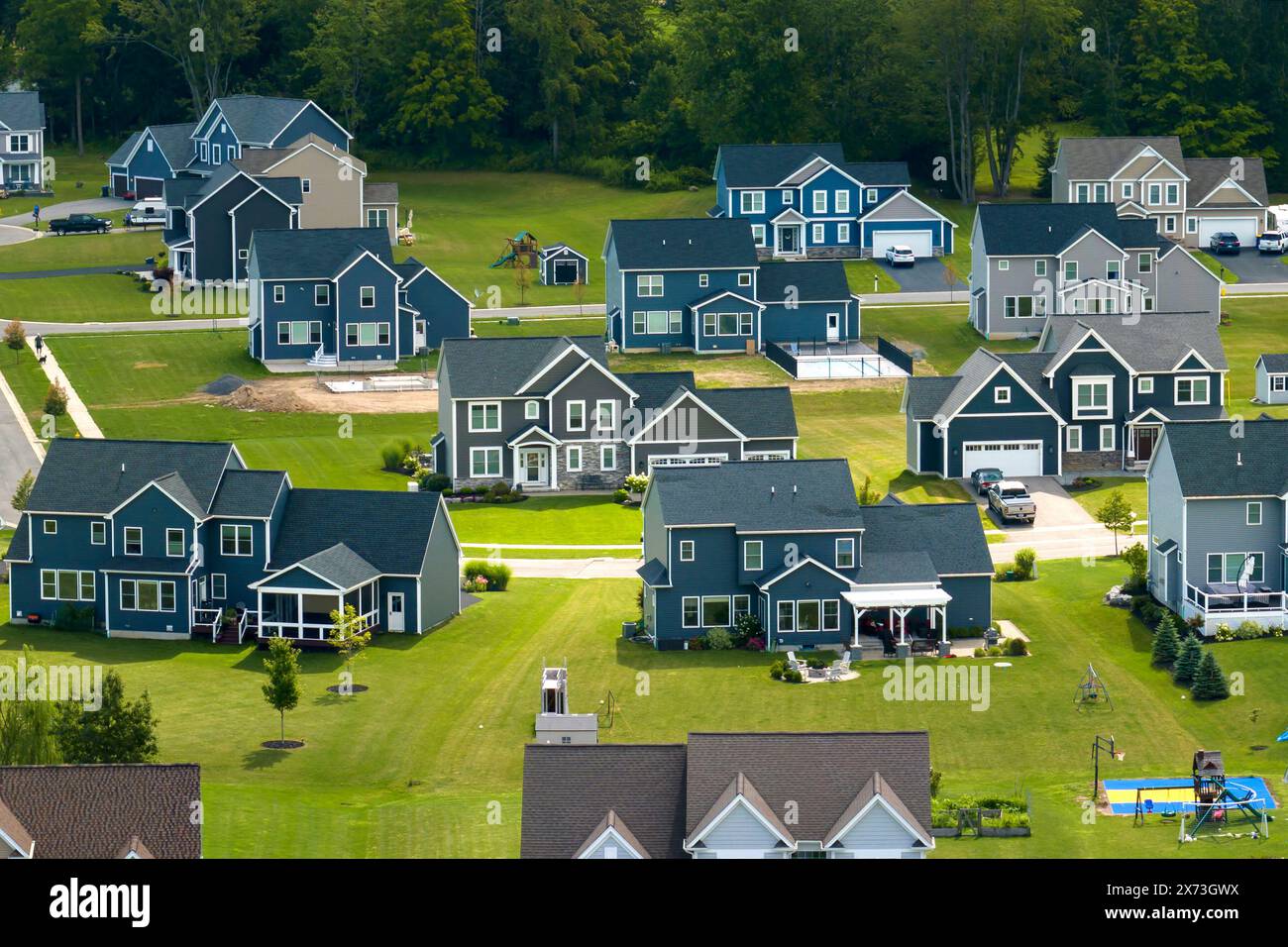 Low-density two story private homes with large lot size and green ...