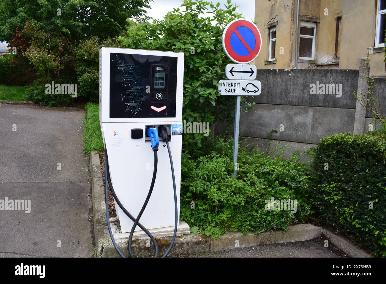 modern EV charger with a touchscreen Stock Photo - Alamy