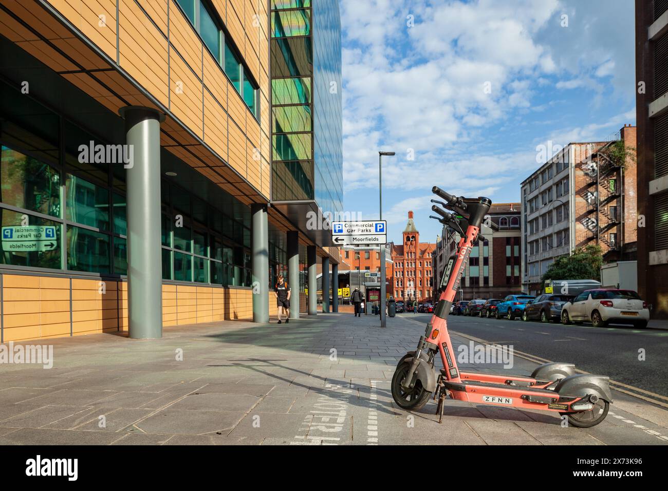 Electric scooters parked on the street in Liverpool city centre Stock ...