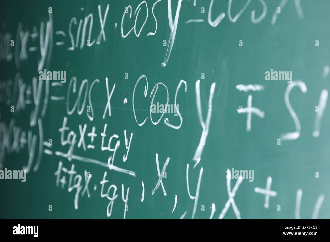 Many different math formulas written on chalkboard, closeup Stock Photo - Alamy