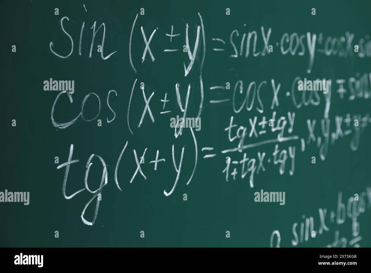 Many different math formulas written on chalkboard Stock Photo - Alamy