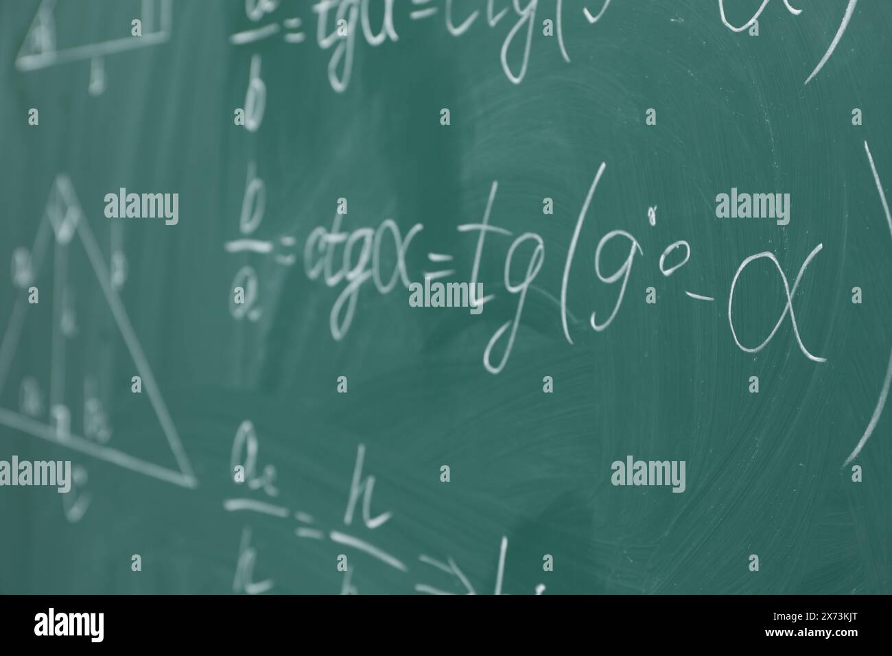 Many different math formulas written on chalkboard Stock Photo - Alamy