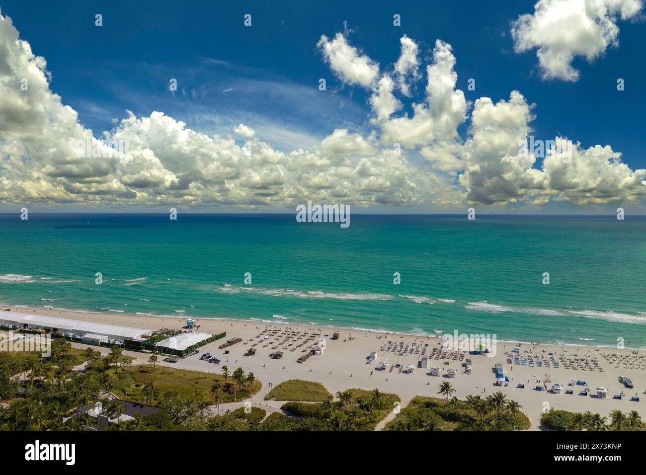 Tourism infrastructure in southern USA. South Beach sandy surface with ...