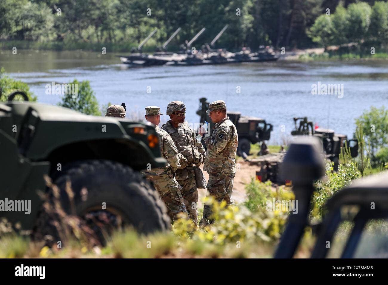 British and American soldiers of the UK 12th Armoured Brigade Combat ...
