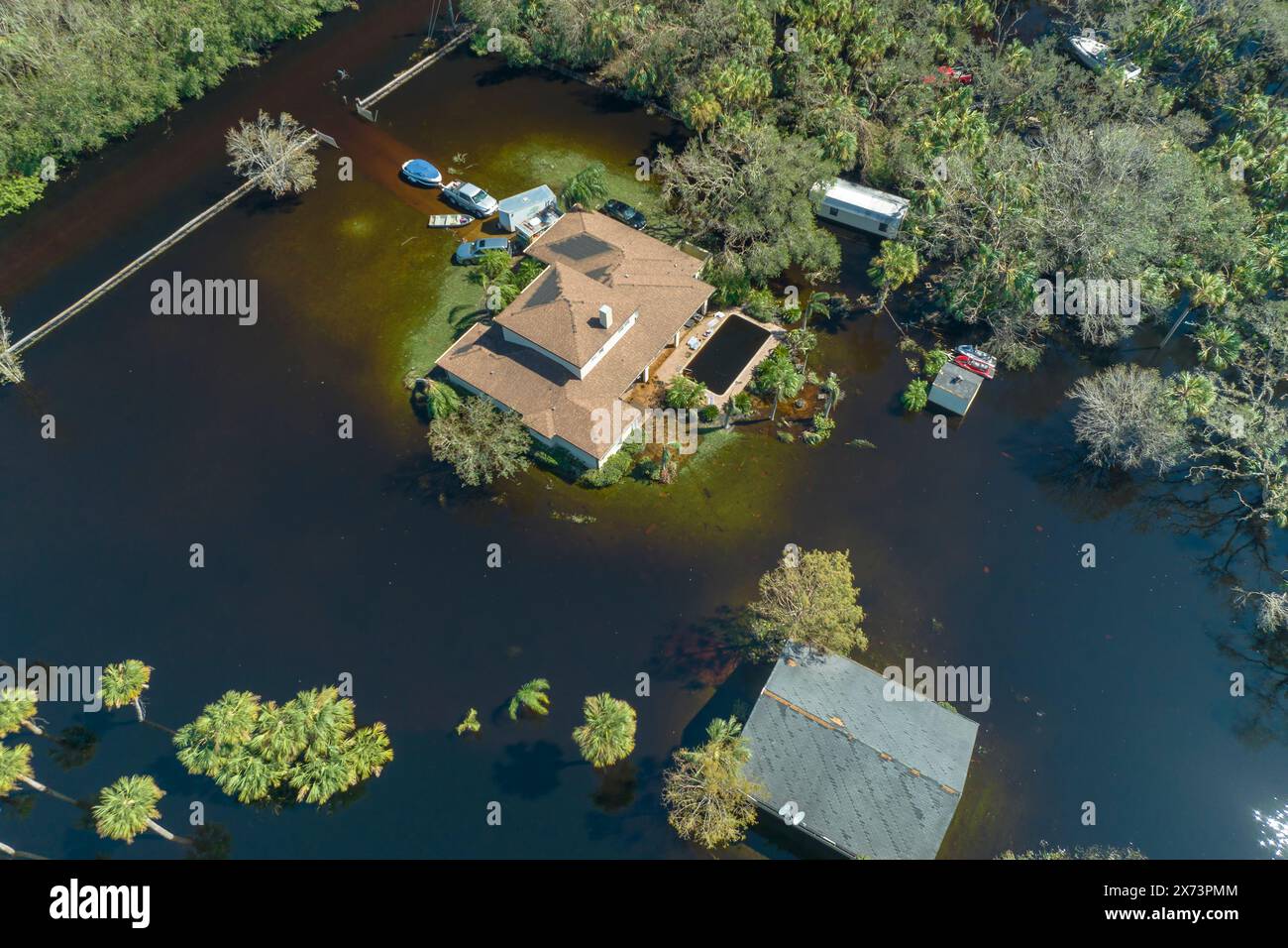 Aftermath of natural disaster. Surrounded by hurricane Ian rainfall ...
