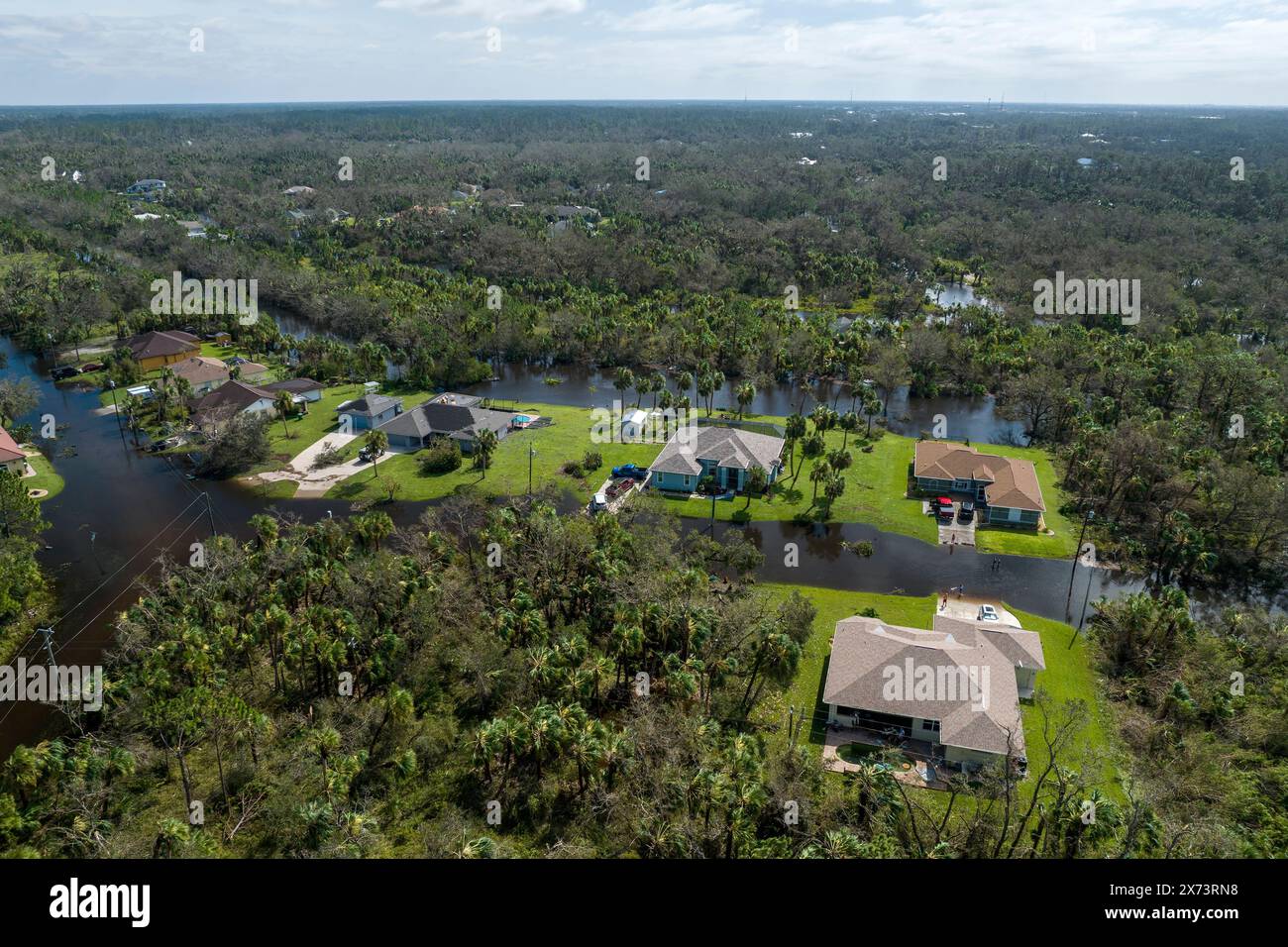 Aftermath of natural disaster. Surrounded by hurricane Ian rainfall ...