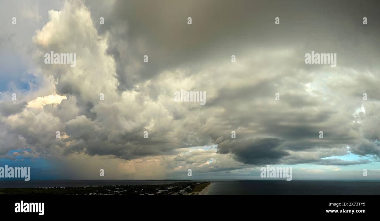 Stormy cumulonimbus clouds forming before thunderstorm on dark sky ...