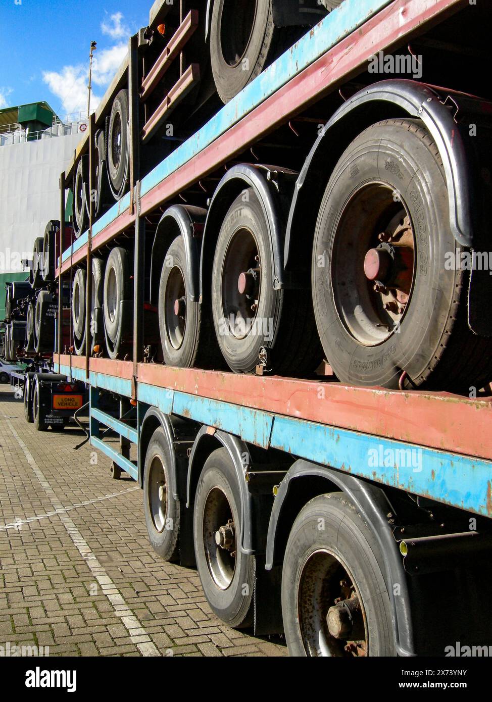 Road trailers stacked Stock Photo - Alamy