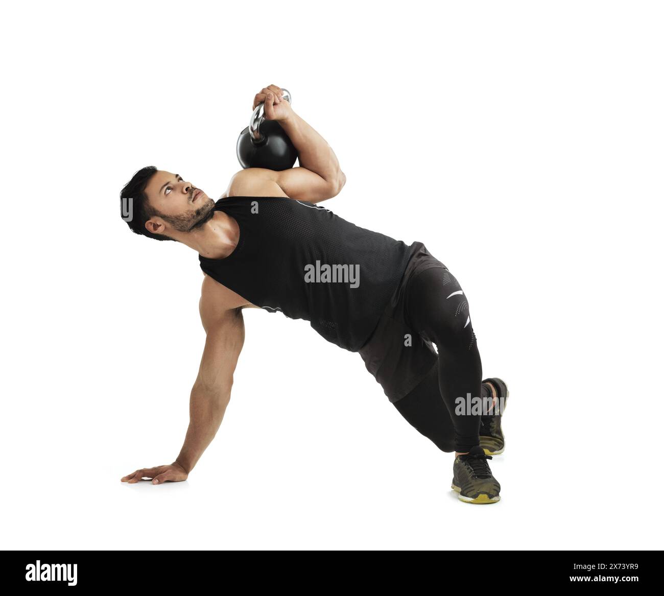 Training, exercise and man with kettlebell in studio for muscle ...