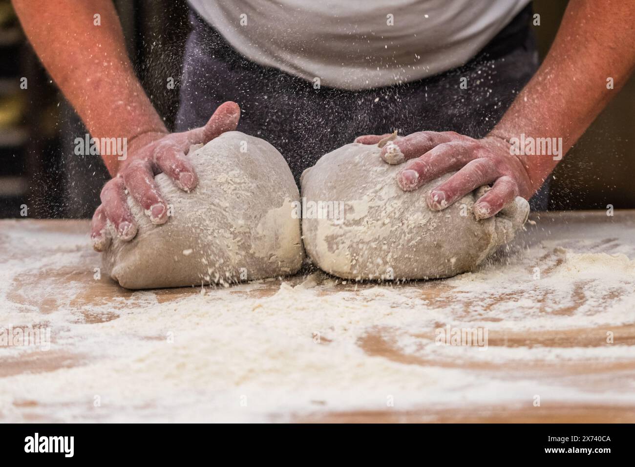 Baker in bakery making hi-res stock photography and images - Alamy